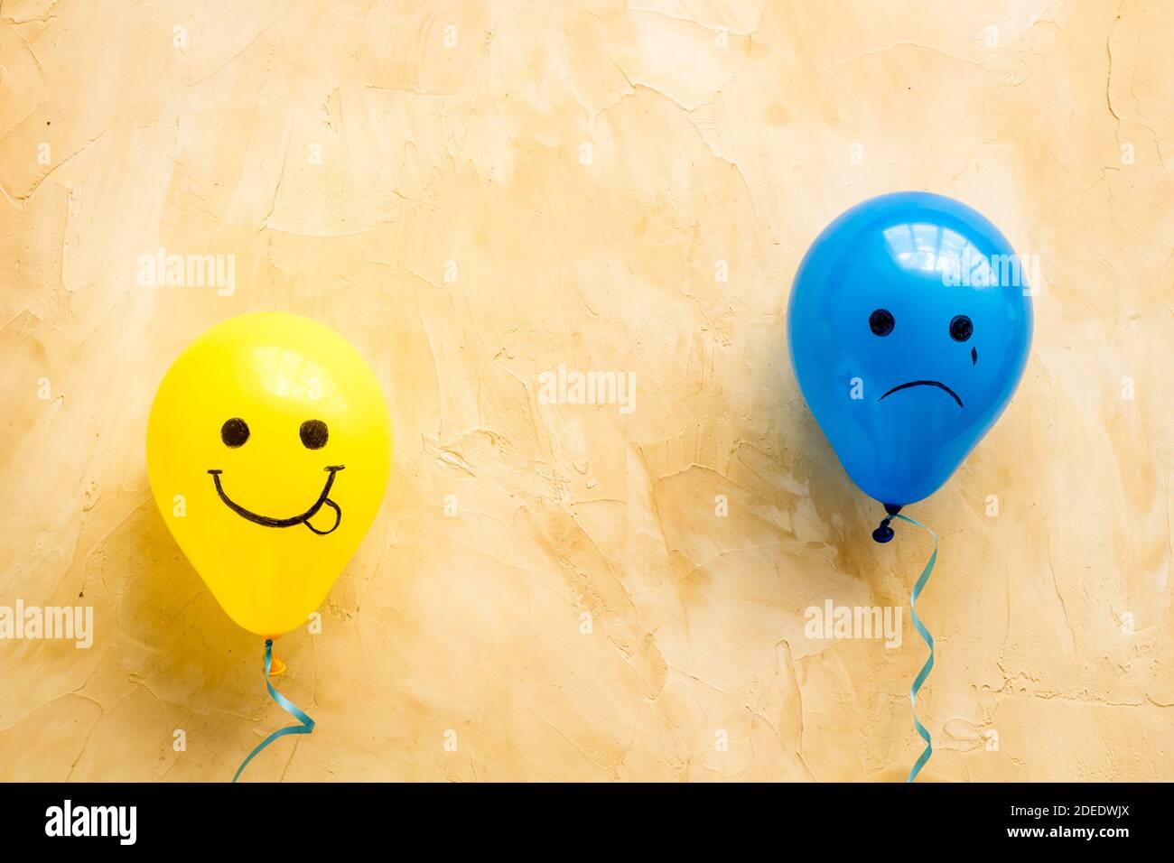 Positive and negative emotions background. Sad and happy faces on ...
