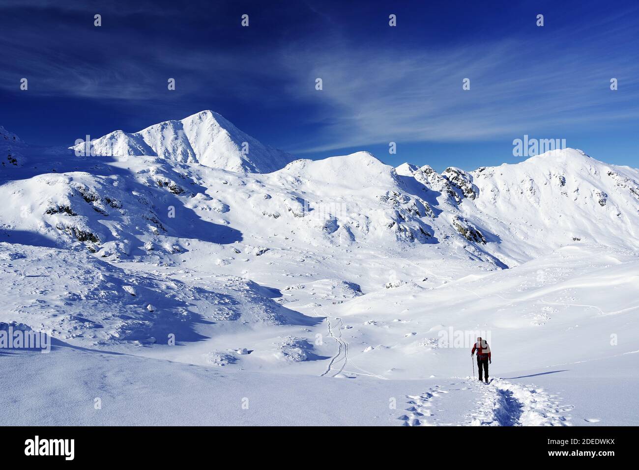 Trekking in harsh winter condition. Winter alpine landscape Stock Photo ...