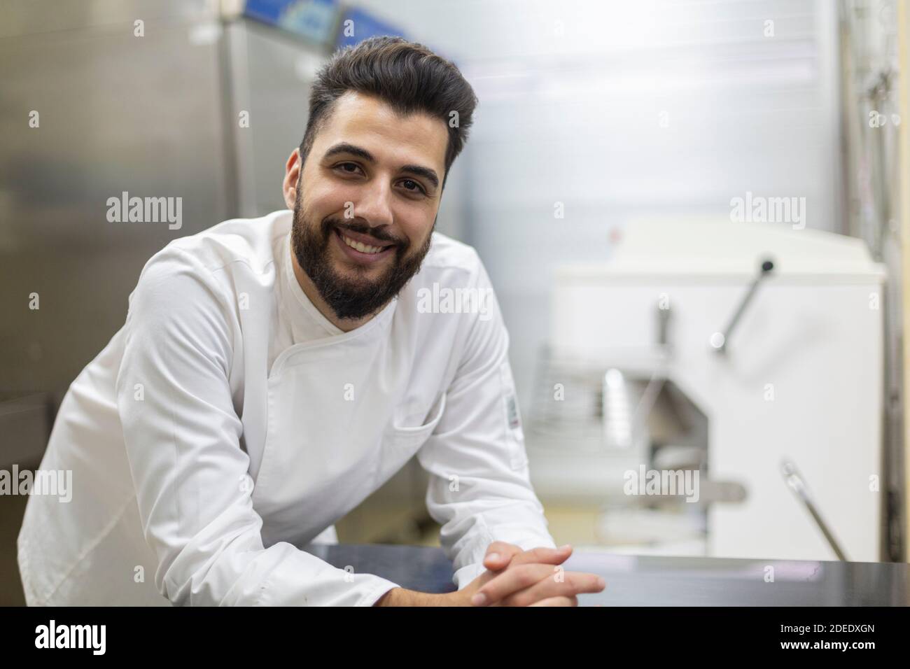 Chef looking to camera hi-res stock photography and images - Alamy