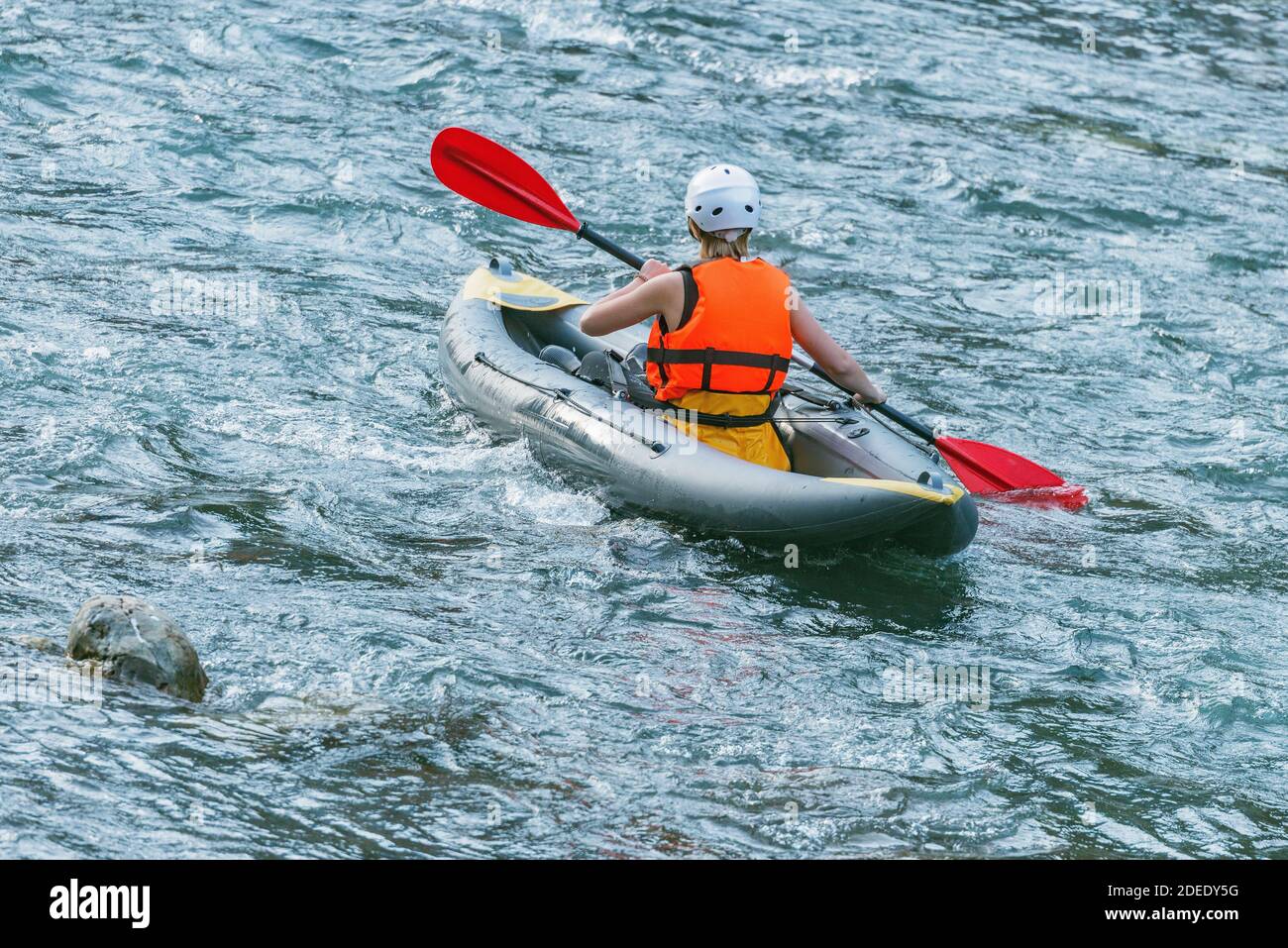 Girl on inflatable boat hi-res stock photography and images - Alamy