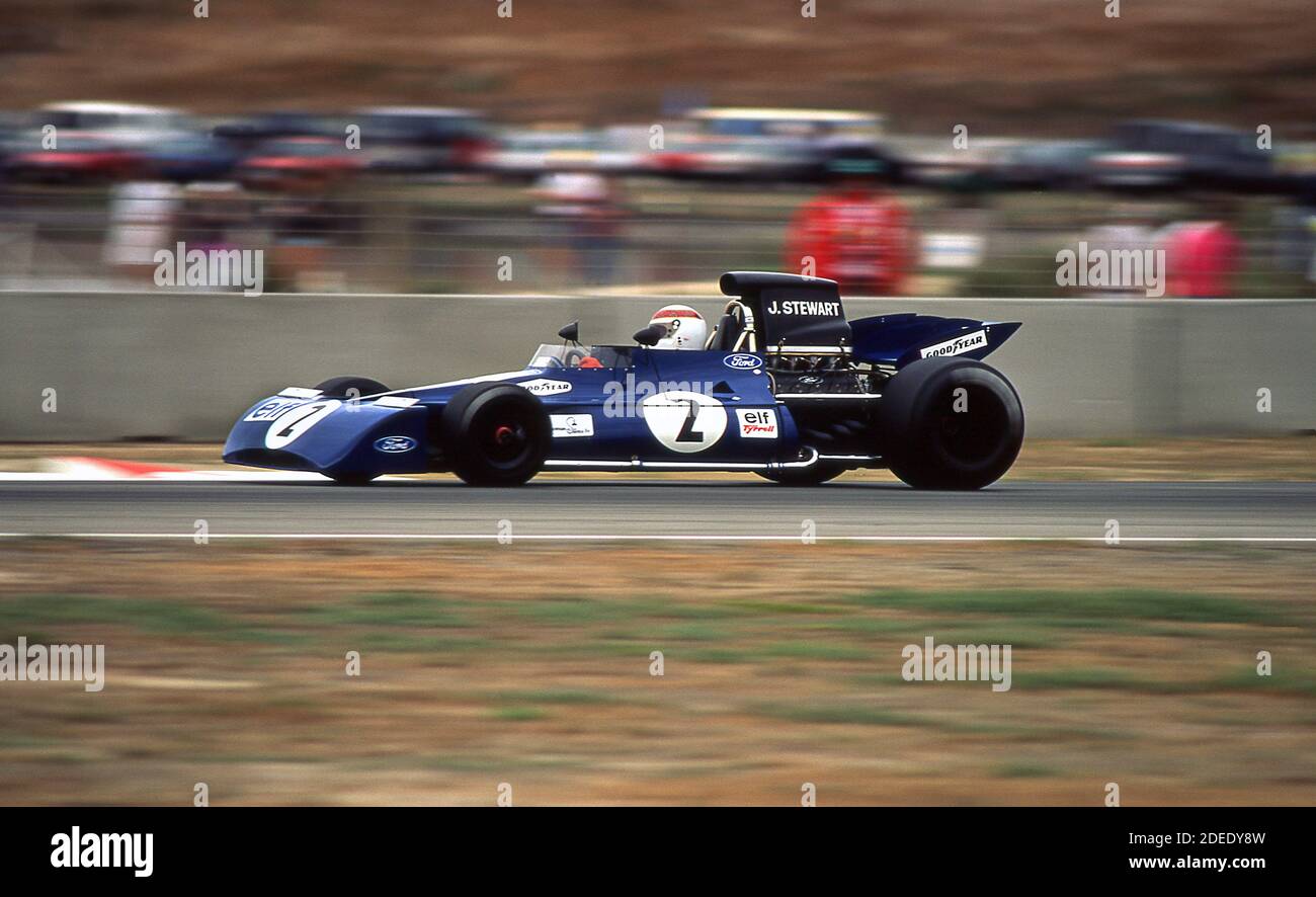 Sir Jacki Stewart driving his 1971 Tyrrll 003 F1 car at the Monterey ...
