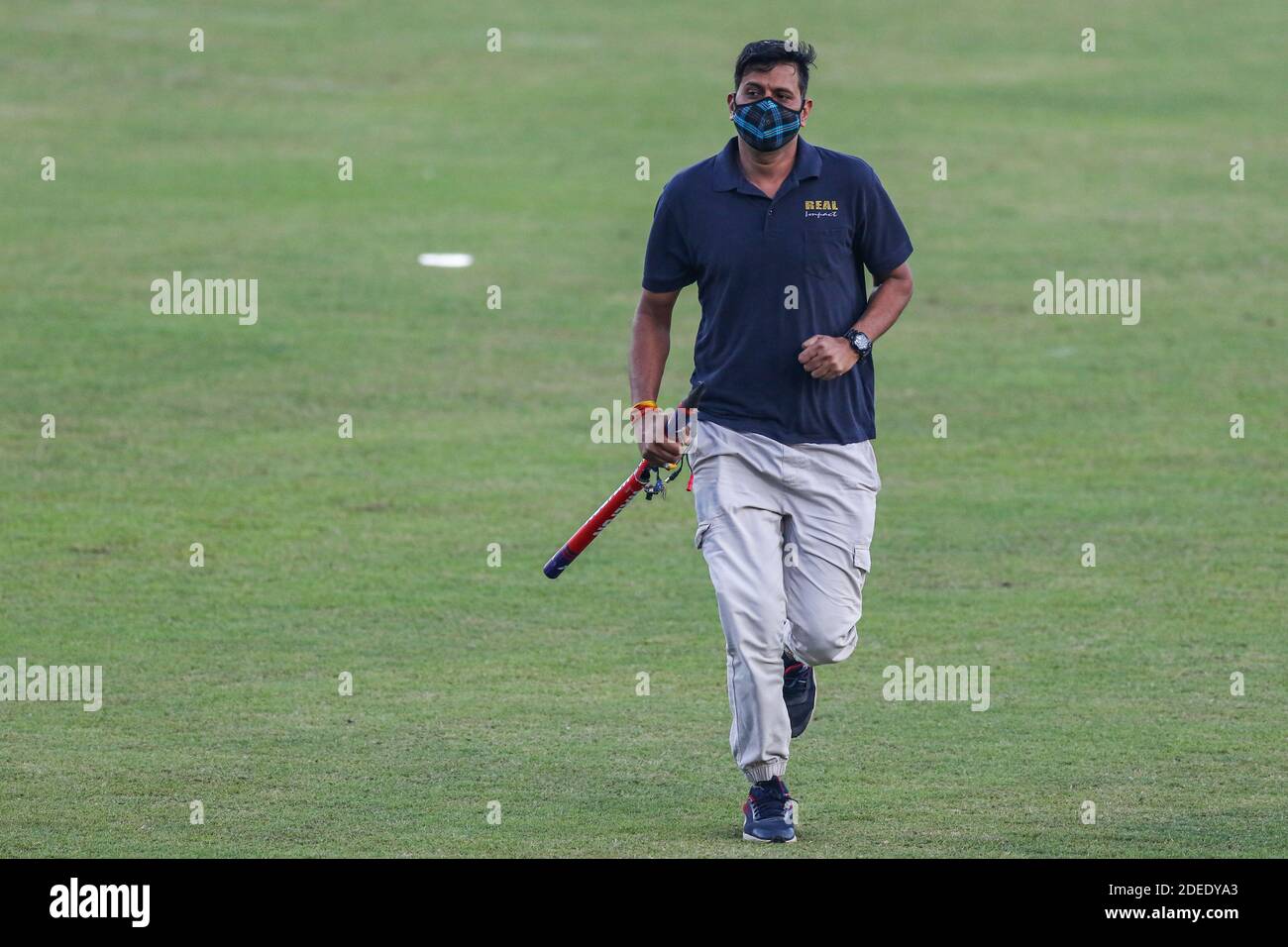 Dhaka, Bangladesh. 30th Nov, 2020. An employee from broadcast holds new stump to replace ...