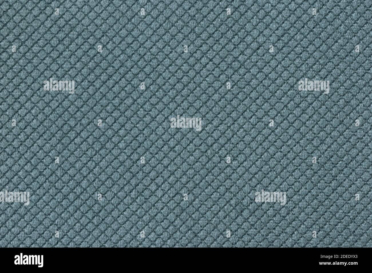 Texture of light blue fluffy fabric background with rhomboid pattern ...