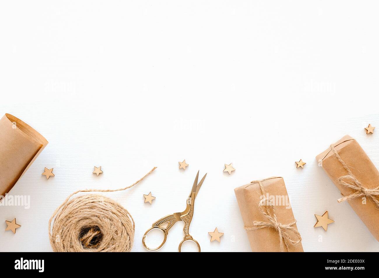 Set of materials for packing holiday gifts. Kraft paper, jute twine ...