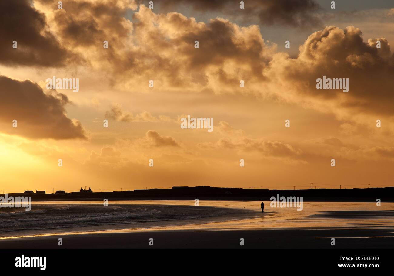 Figure on the beach, Gott Bay, Tiree, Scotland Stock Photo - Alamy
