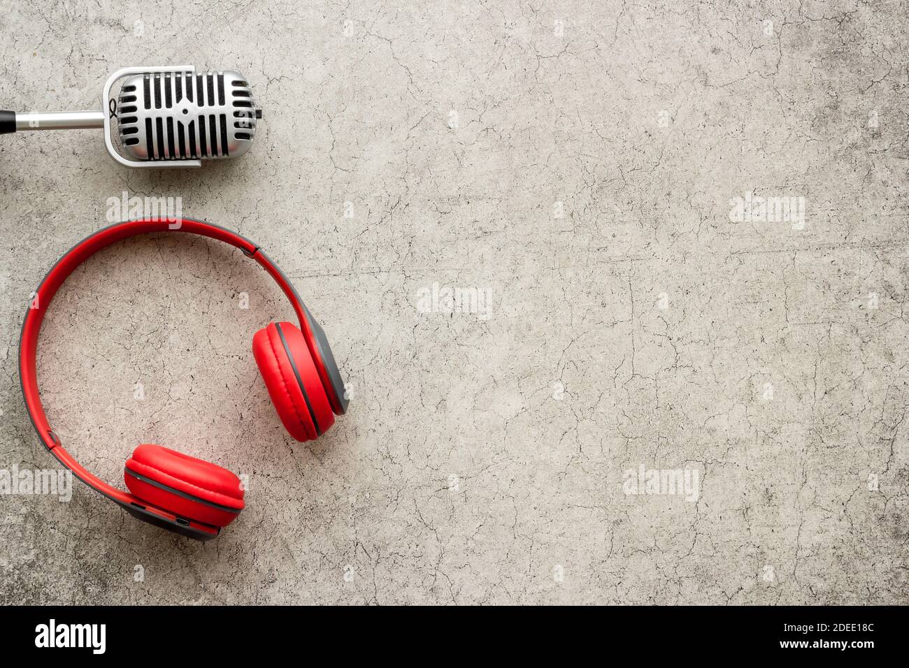 Studio microphone and headphones, top view. Recording podcast and ...