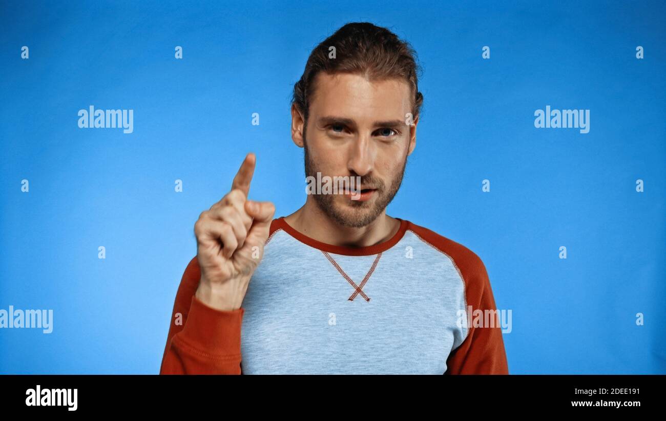 Young bearded caucasian man pointing hi-res stock photography and ...
