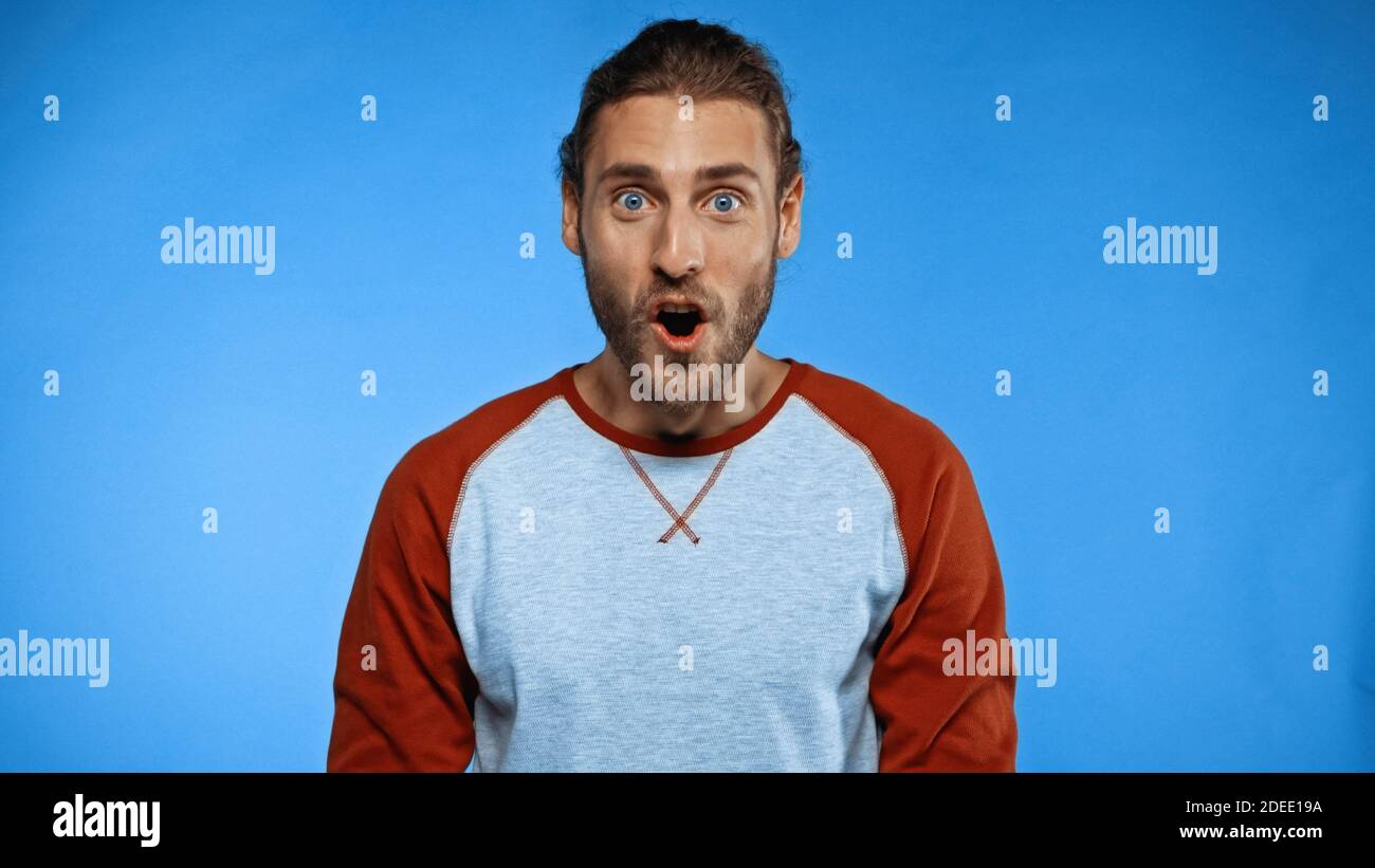 Shocked young man hi-res stock photography and images - Alamy