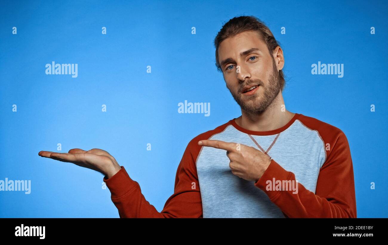 Man hand pointing long hi-res stock photography and images - Alamy