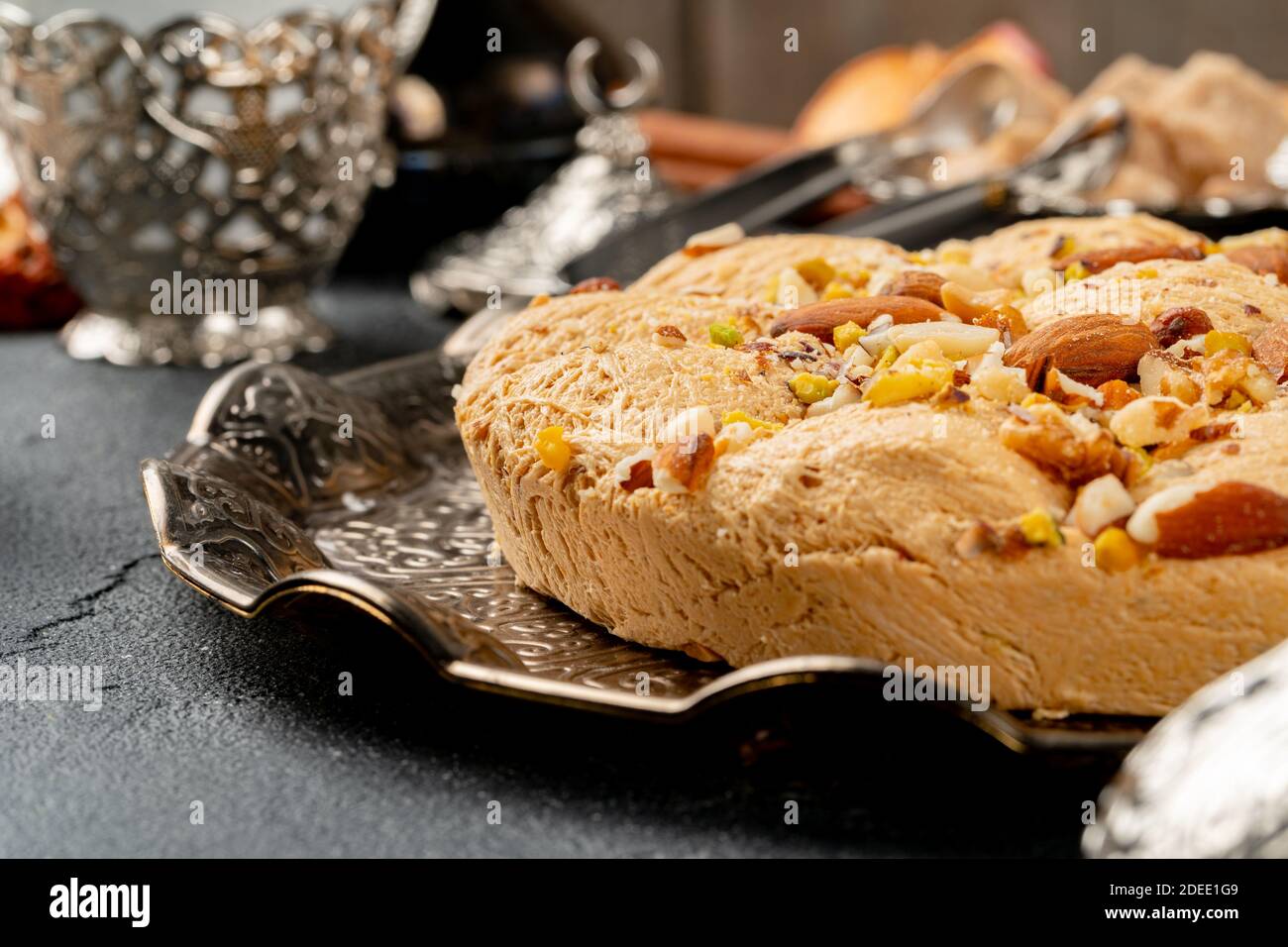 Close up photo of halva dessert on silver plate Stock Photo - Alamy