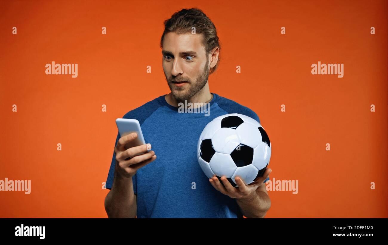 Football fan using mobile phone hi-res stock photography and images - Alamy