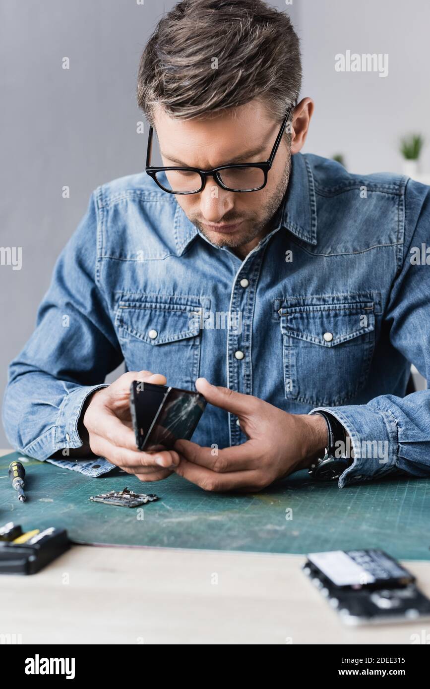 Smashed smartphone parts hi-res stock photography and images - Alamy