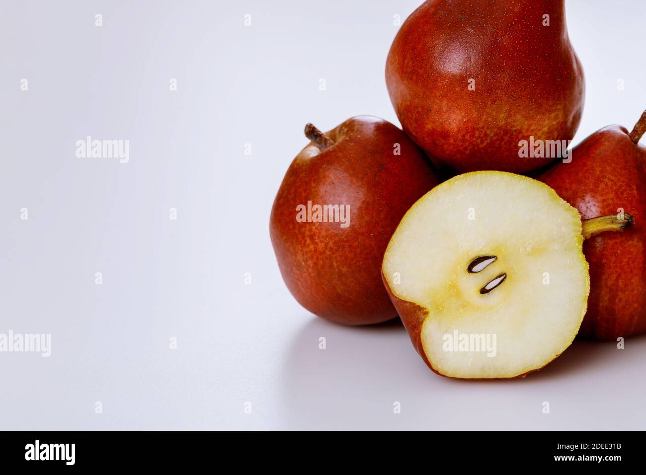 Red shiny pears isolated on white background. Produce product Stock ...