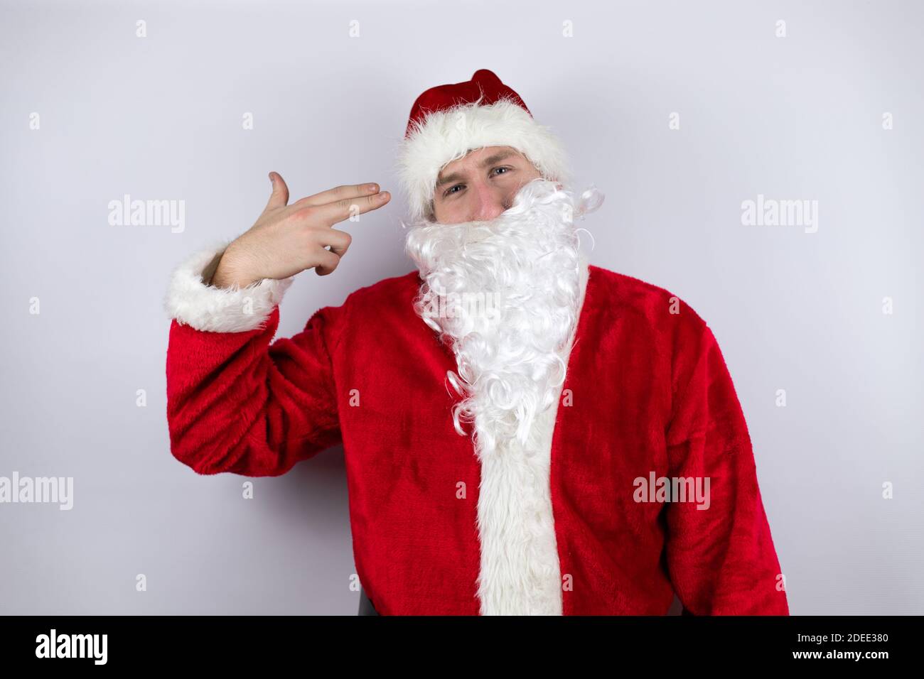 Santa holding gun hi-res stock photography and images - Alamy