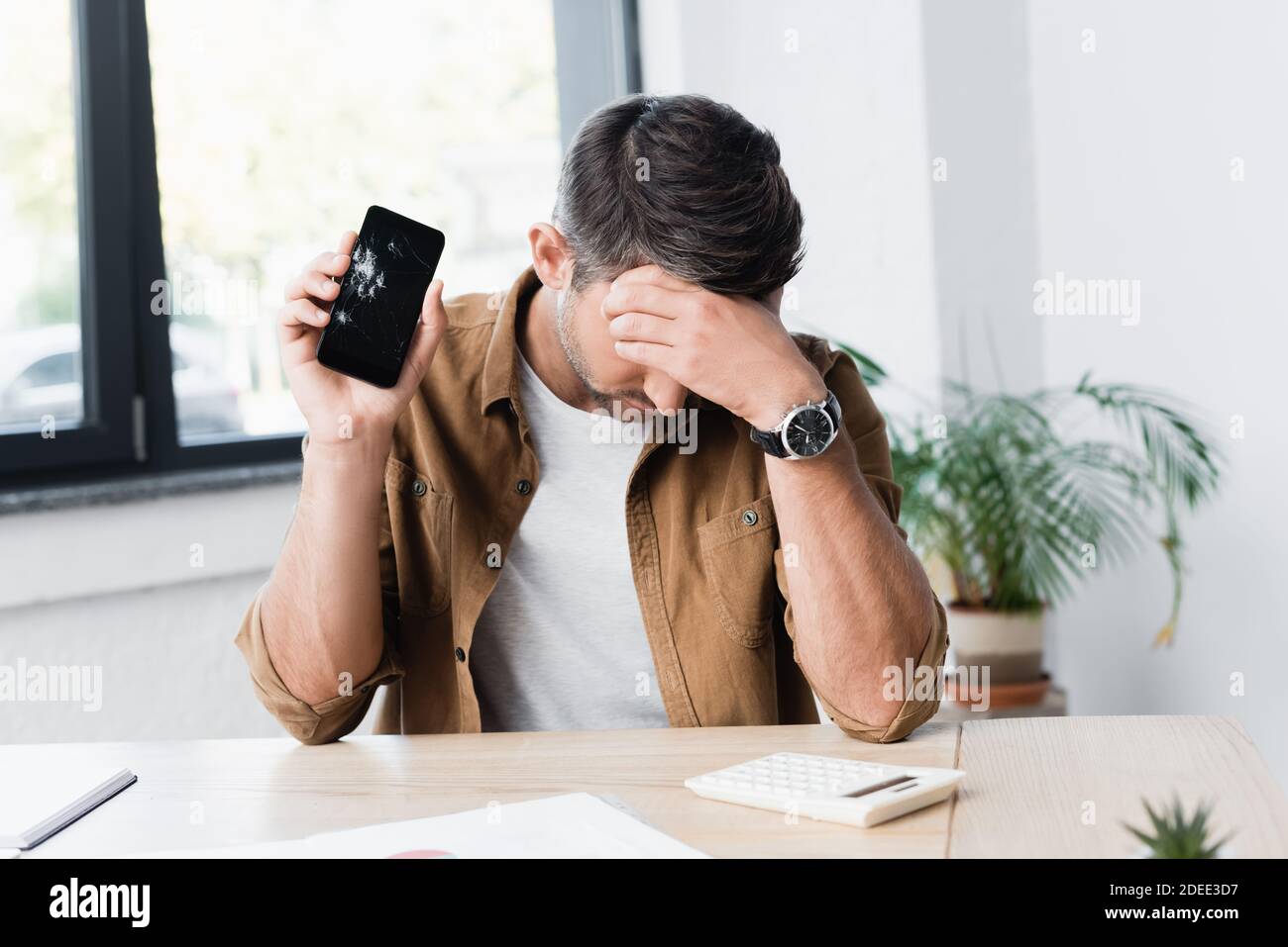 Smashed calculator hi-res stock photography and images - Alamy