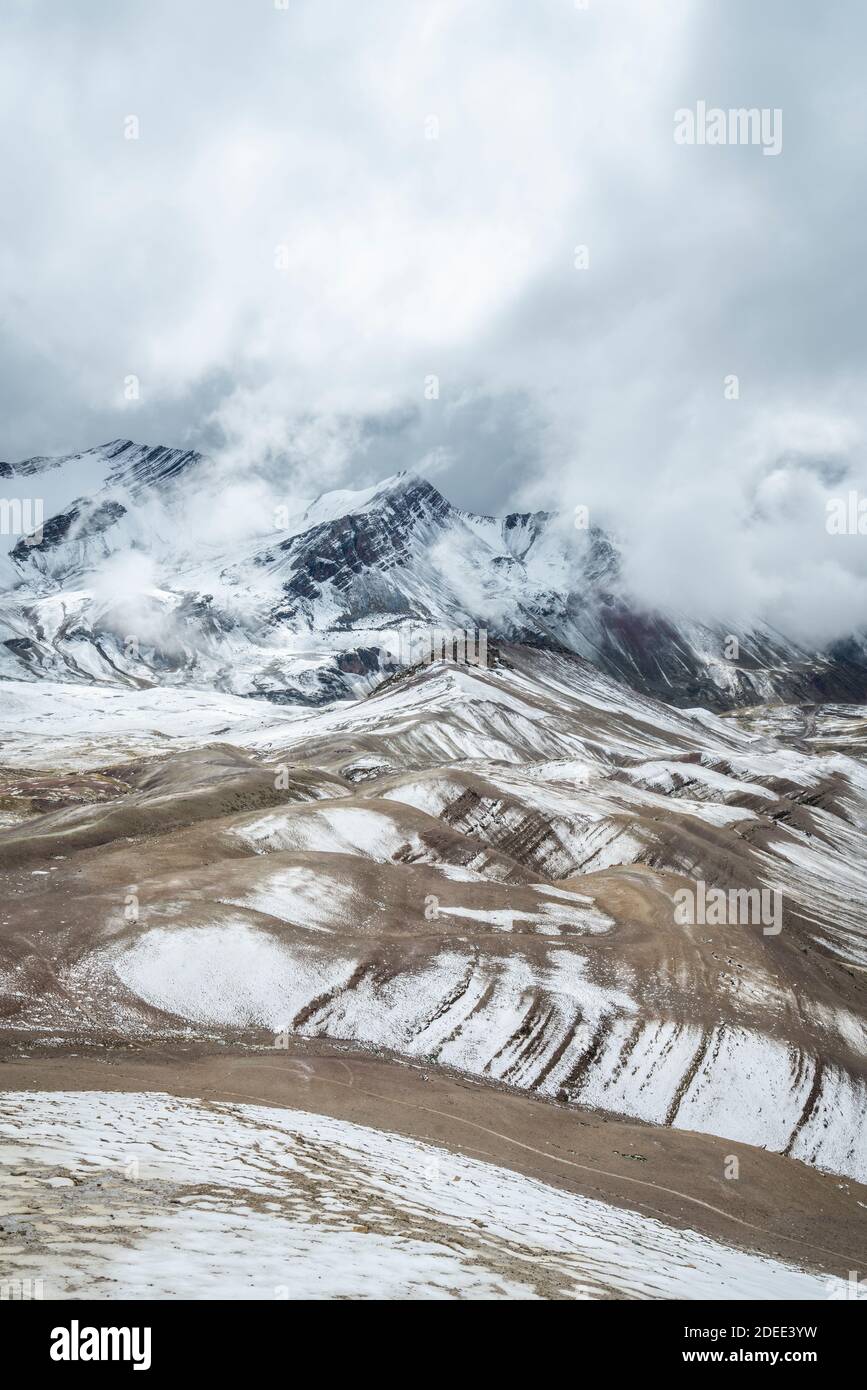 Scenic view of valley amongst high Andes mountains on Rainbow Mountain ...