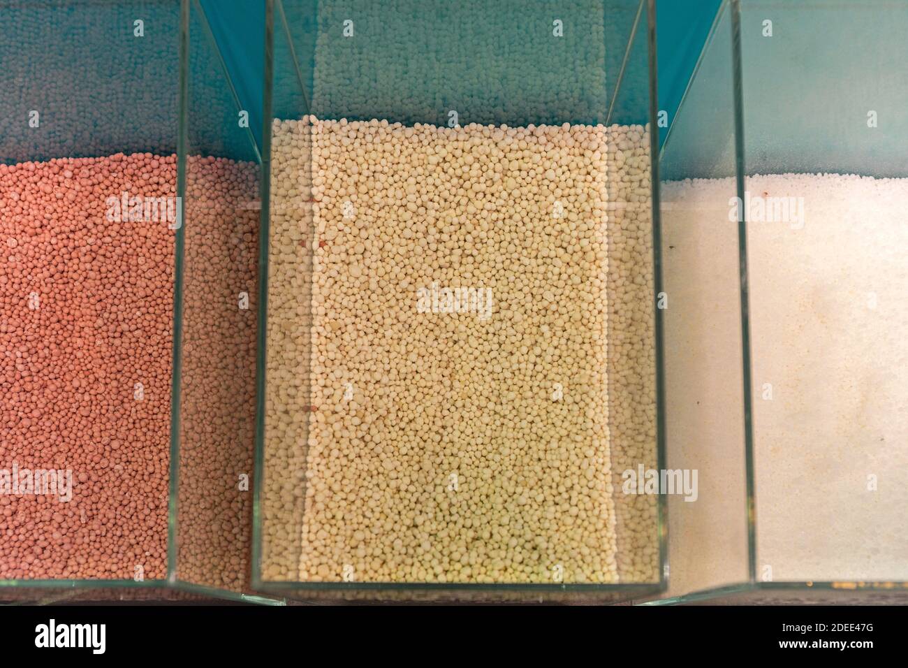 Bunch of Bulk Fertilizer Balls in Glass Box Stock Photo - Alamy