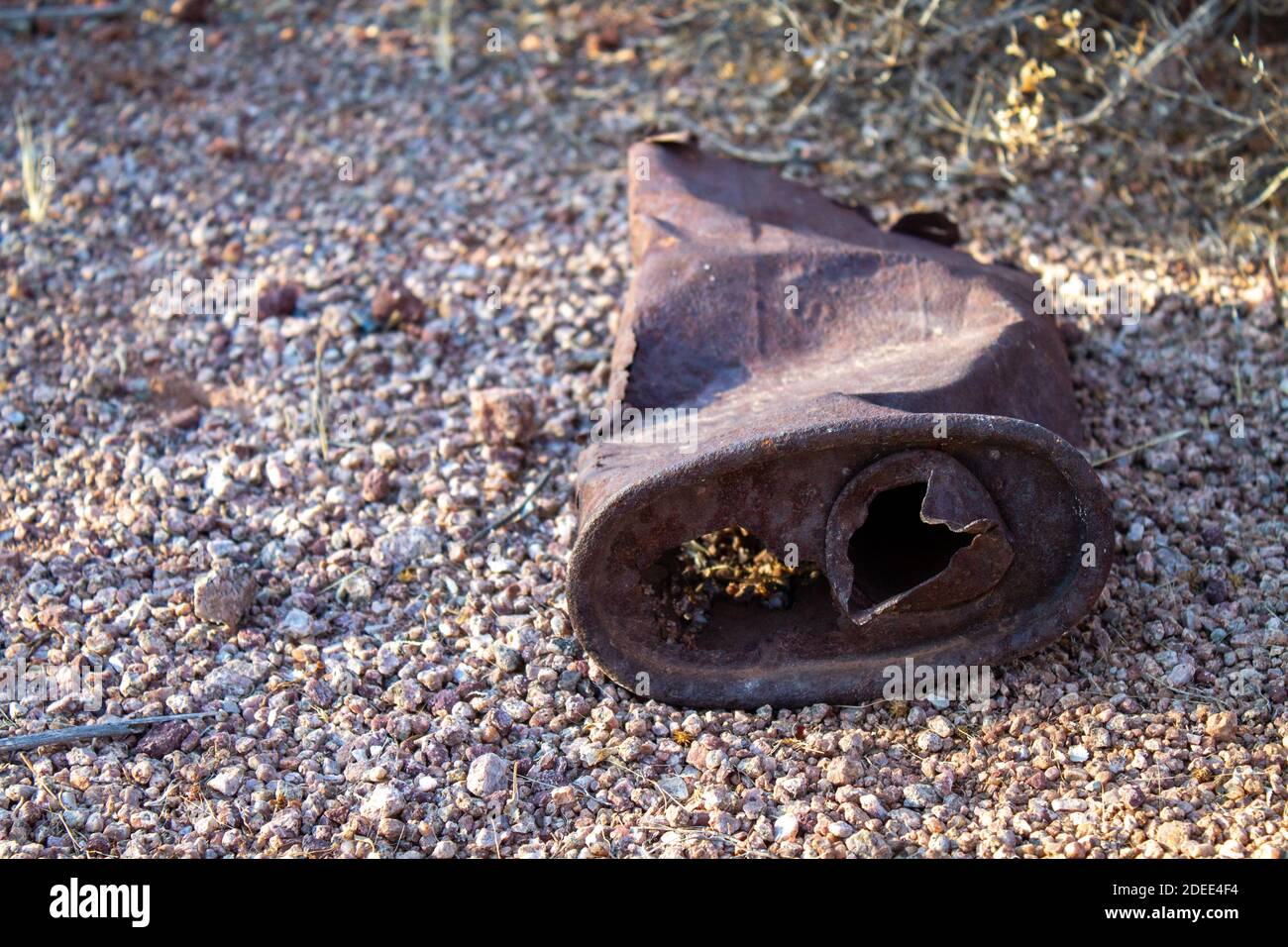 Old muffler in middle of Arizona desert Stock Photo - Alamy