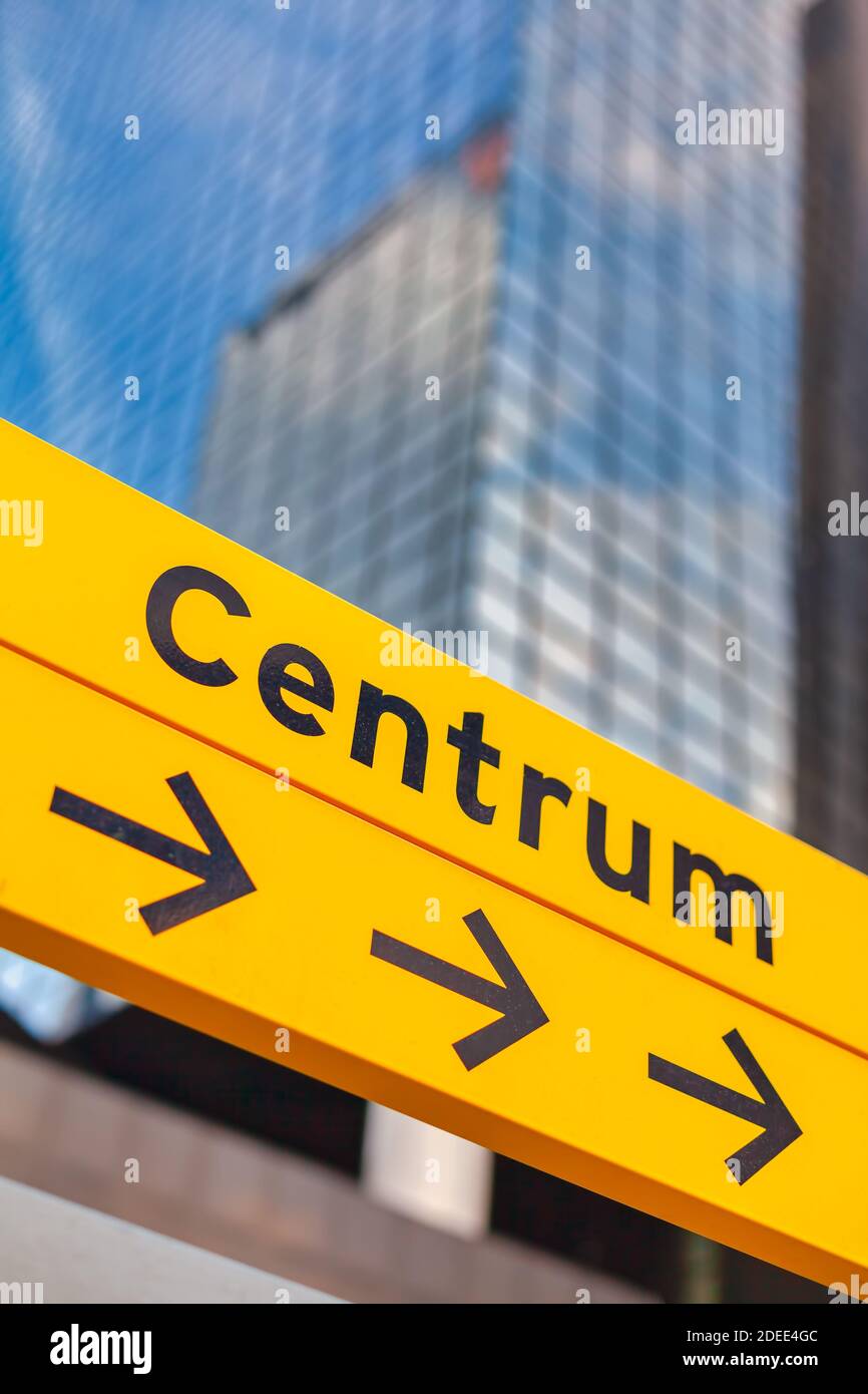 City sign in Rotterdam with the Dutch text 'centre' and arrows showing ...