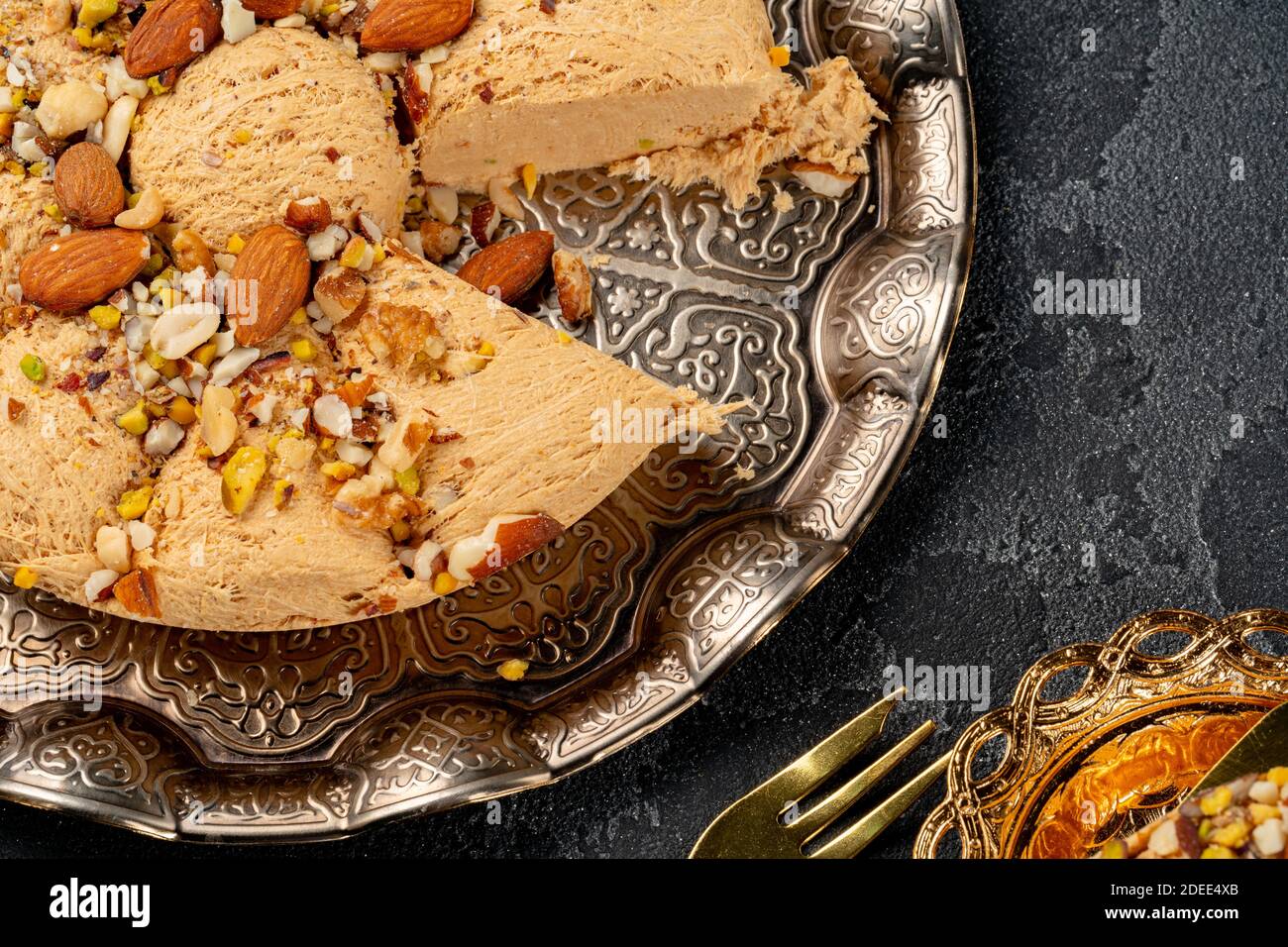 Close up photo of halva dessert on silver plate Stock Photo - Alamy