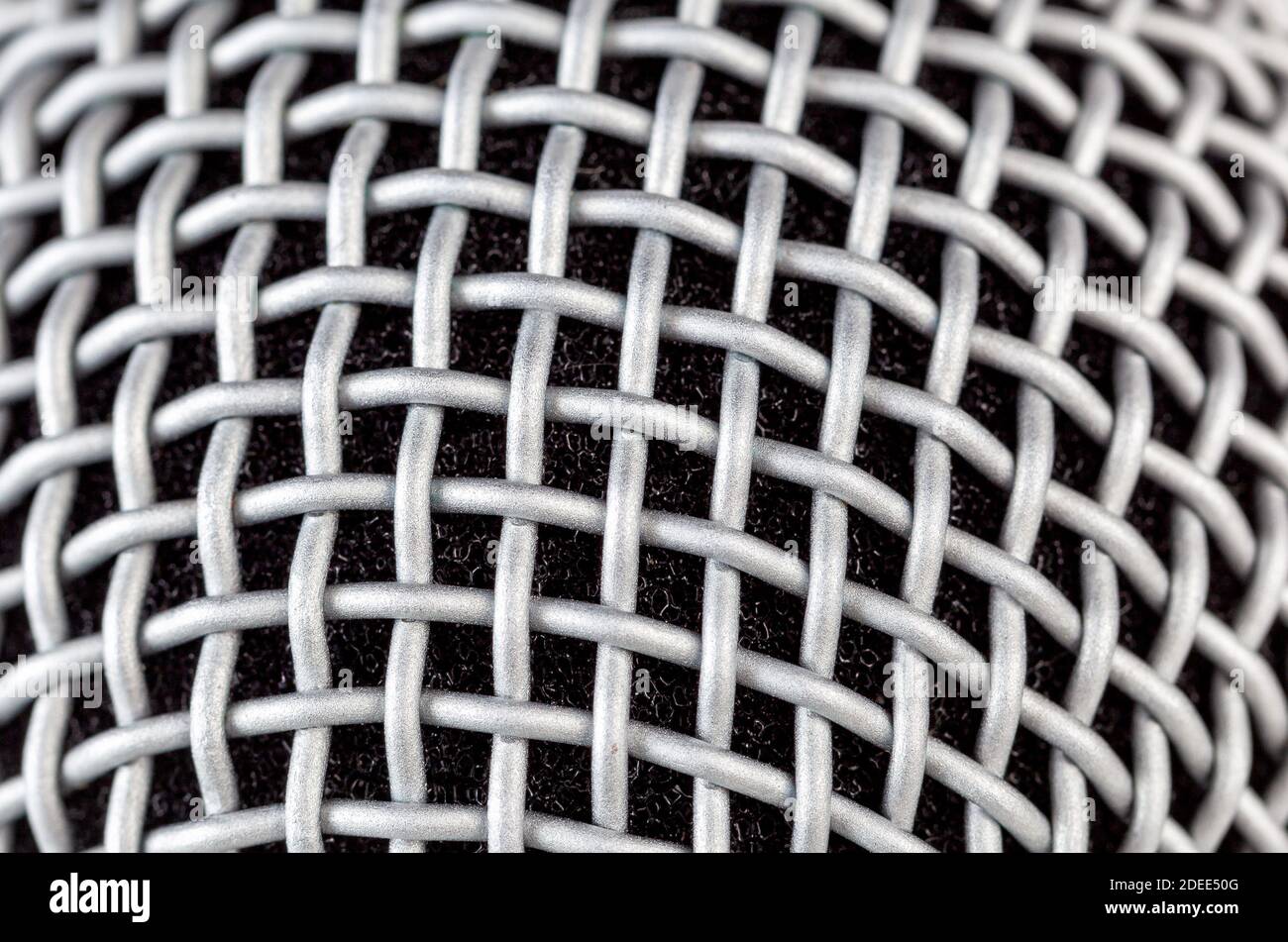 Simple silver microphone grill background texture, macro, extreme ...