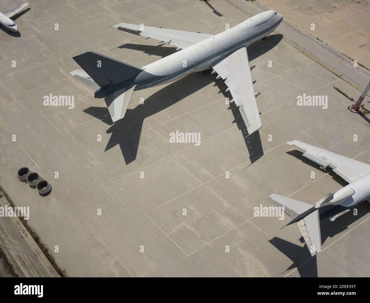Aerial top view, angle shot of an airport terminal with two airplanes ...