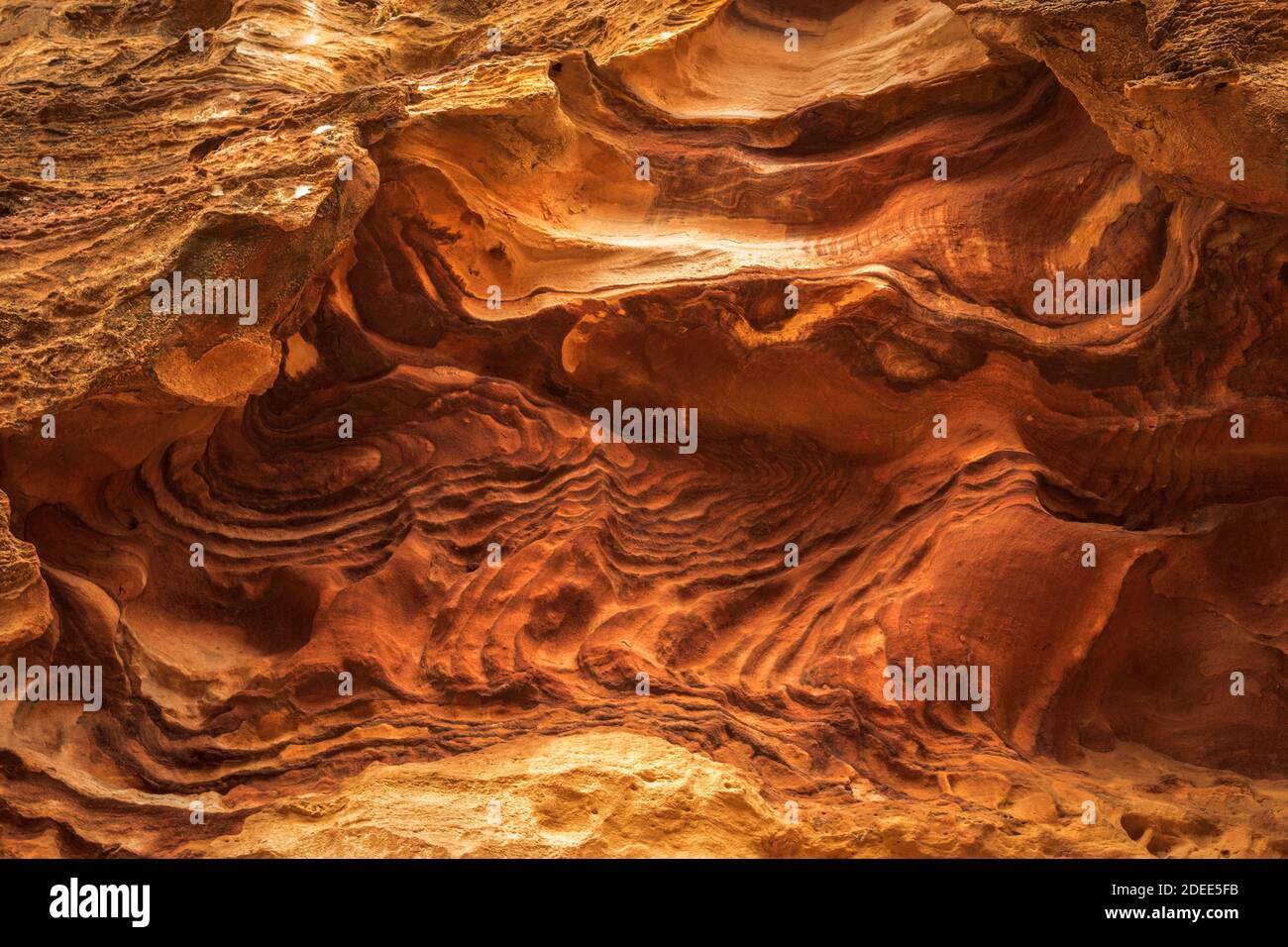 Rocks with colored layers in Petra in Jordan Stock Photo - Alamy