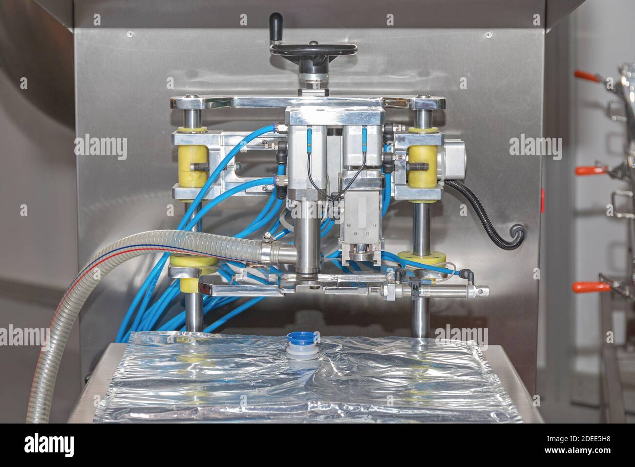 Mylar Foil Bag Filling Machine in Food Factory Stock Photo - Alamy