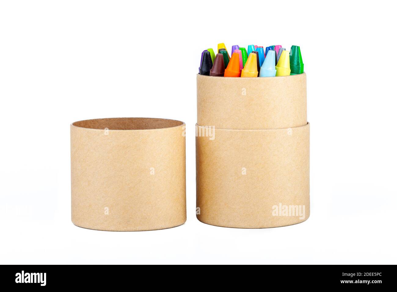 Colorful thin wax crayons set in an open eco friendly brown paper tube ...