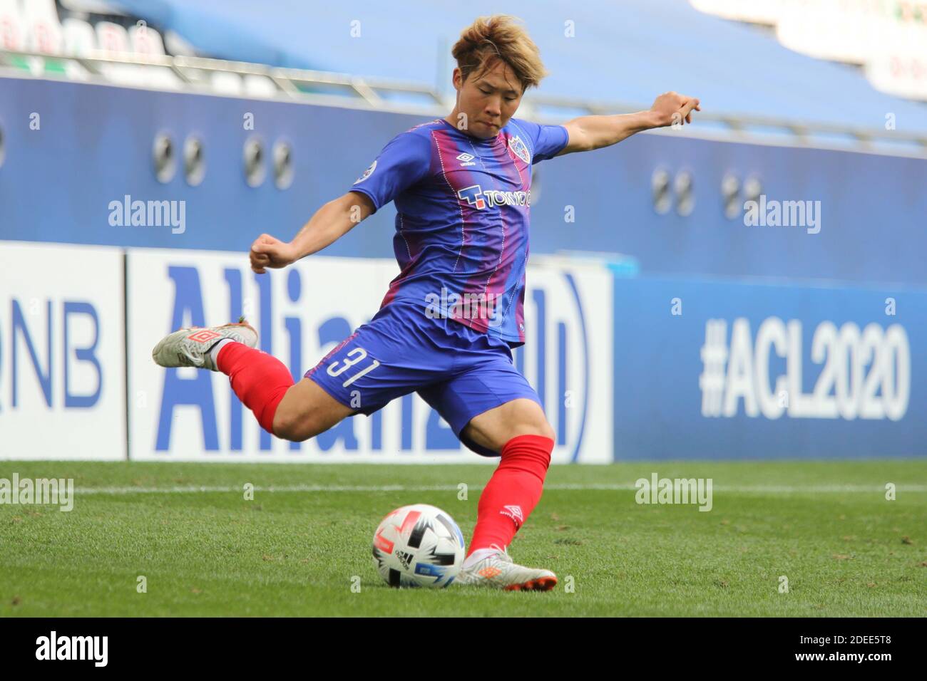 DOHA, QATAR - NOVEMBER 30: Shuto Abe of FC Tokyo crosses the ball into ...