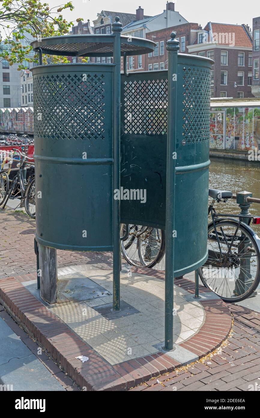 Public Toilet Cabin at Canal in Amsterdam Stock Photo - Alamy