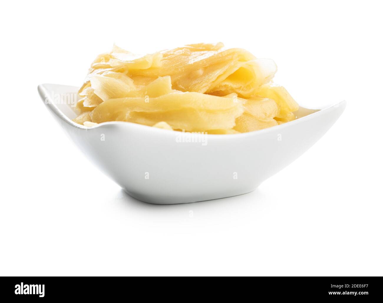 Pickled sushi ginger slices in bowl isolated on white background Stock ...