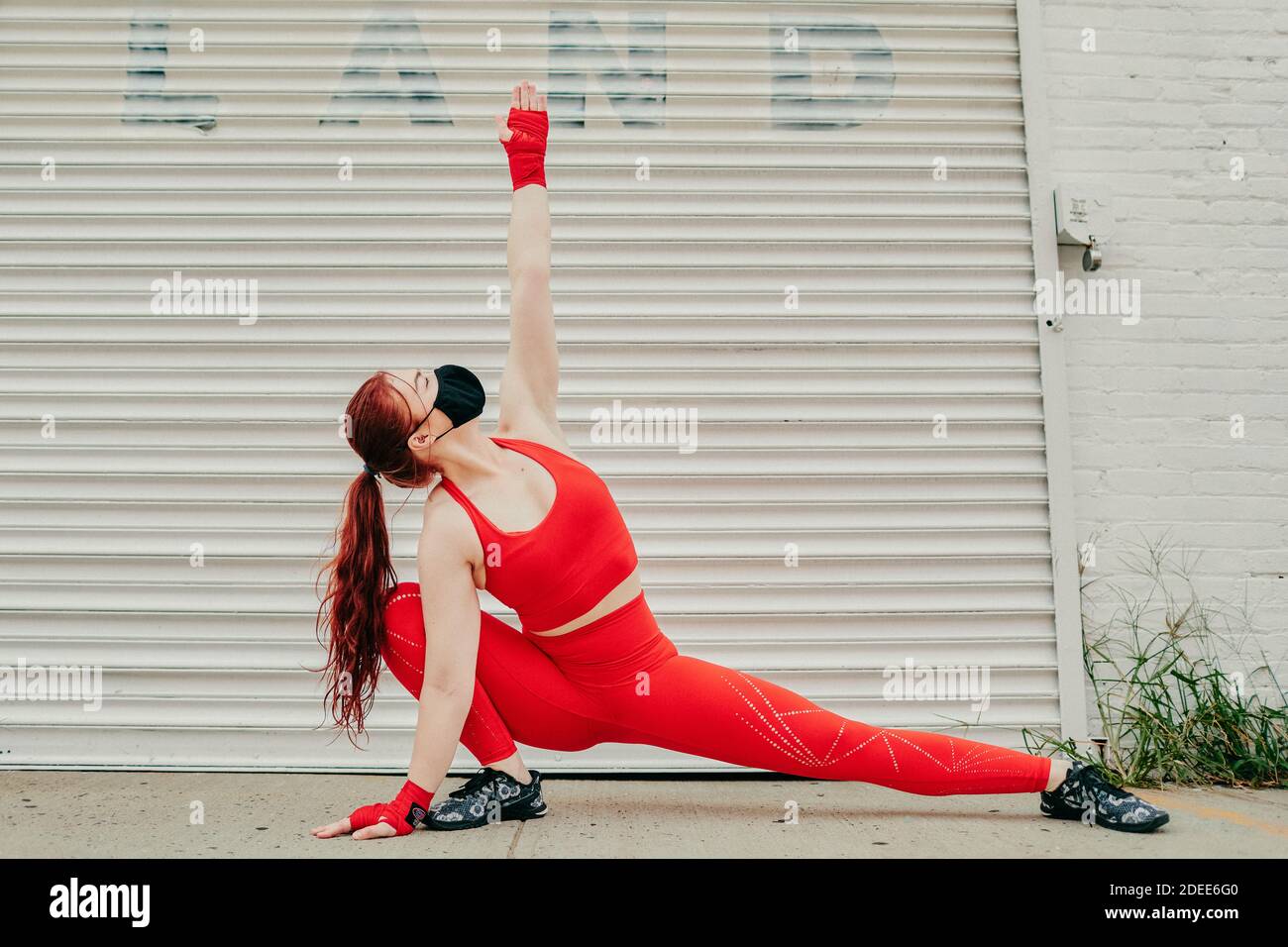 Young female boxer stretching hi-res stock photography and images - Alamy