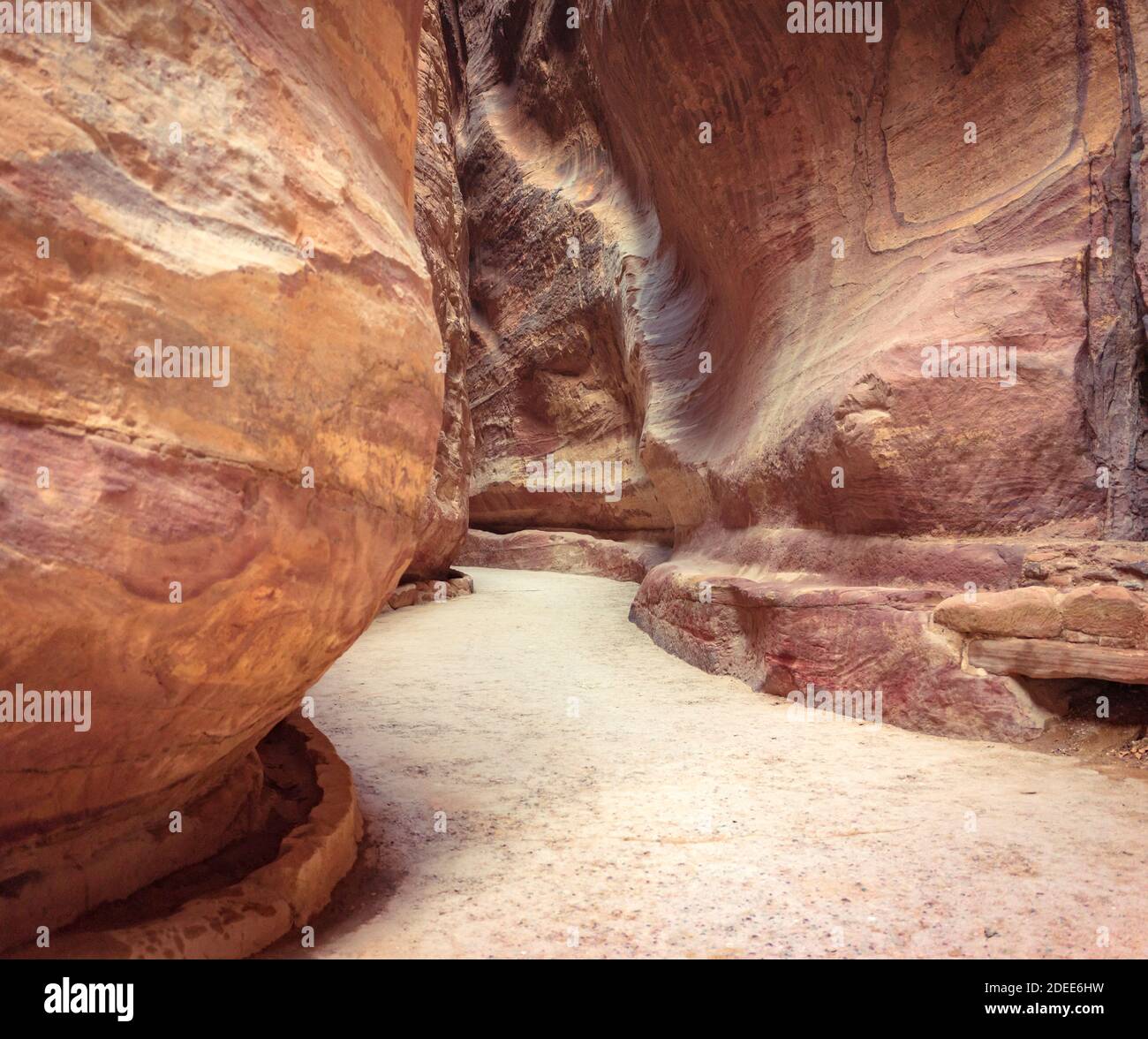 The Siq, the narrow slot-canyon that serves as the entrance passage to ...