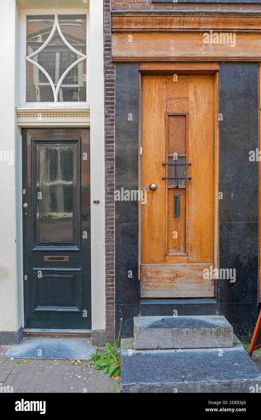 Two Different Doors at Houses in Amsterdam Stock Photo - Alamy