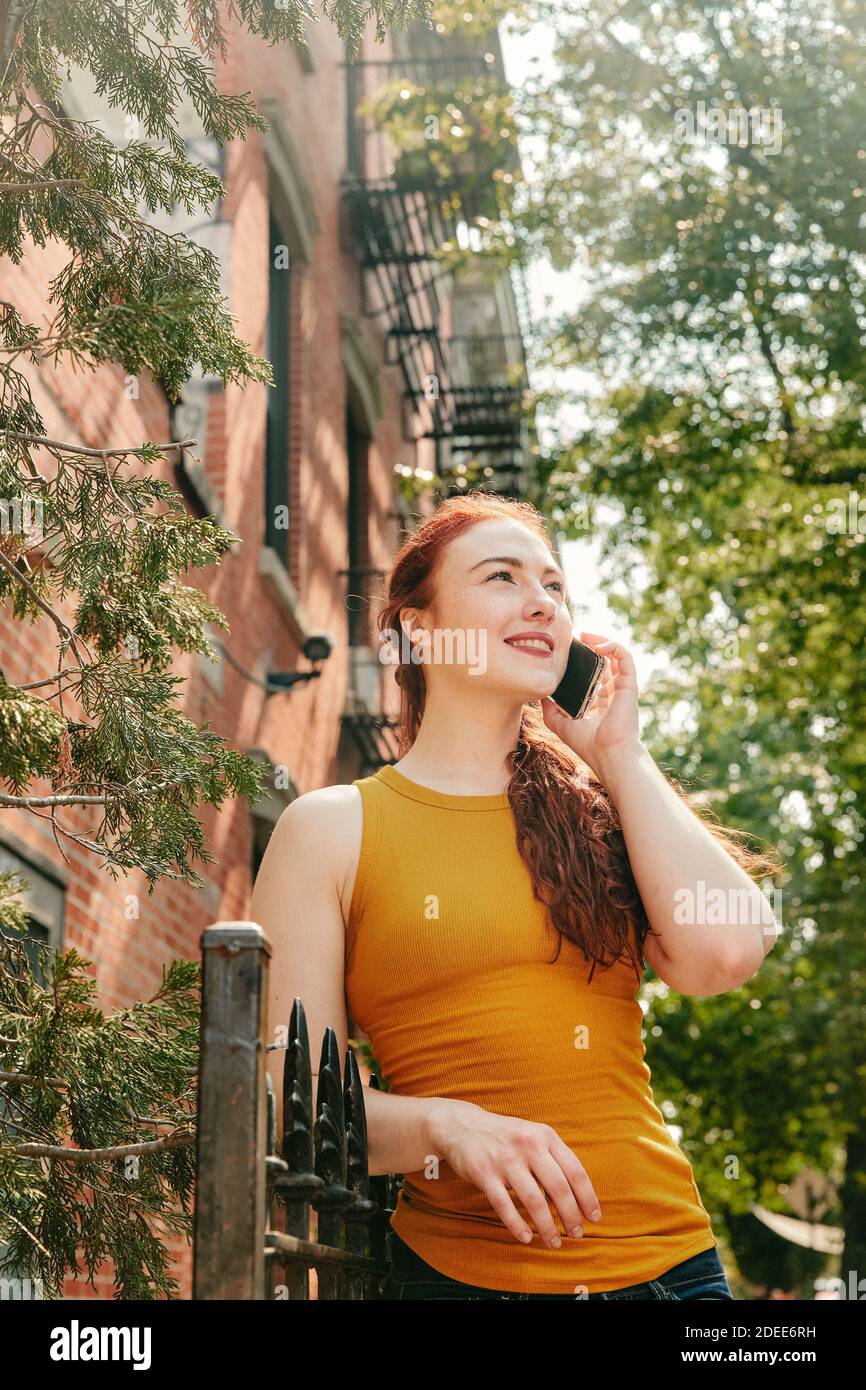 Happily talking hi-res stock photography and images - Alamy