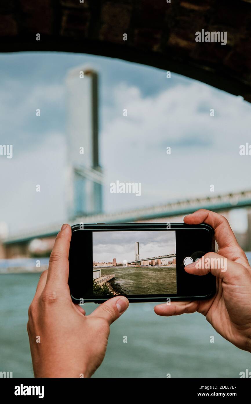 Phone screen taking picture of city skyline Stock Photo - Alamy