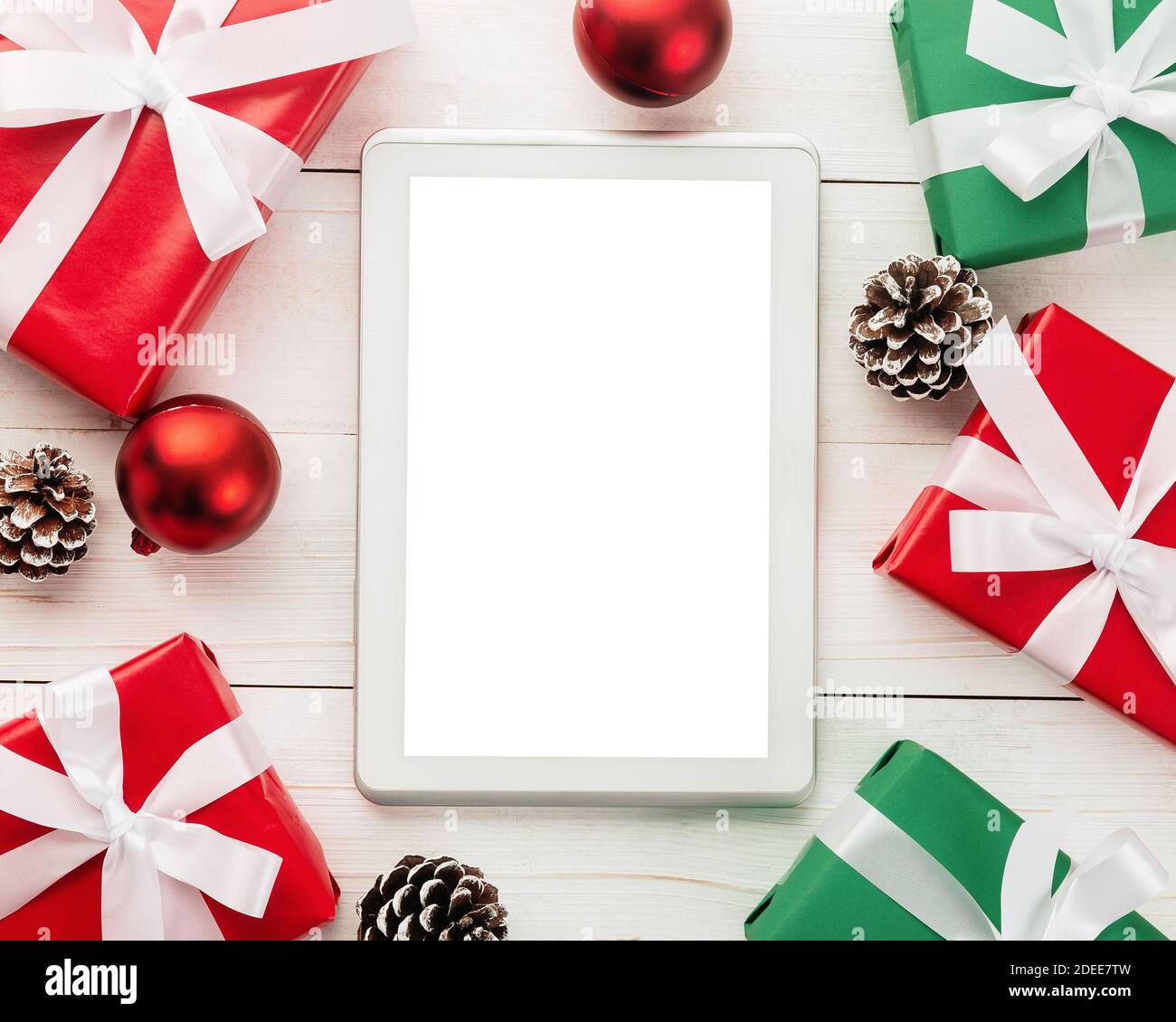 Merry christmas tablet computer mockup template with pine leaves ...