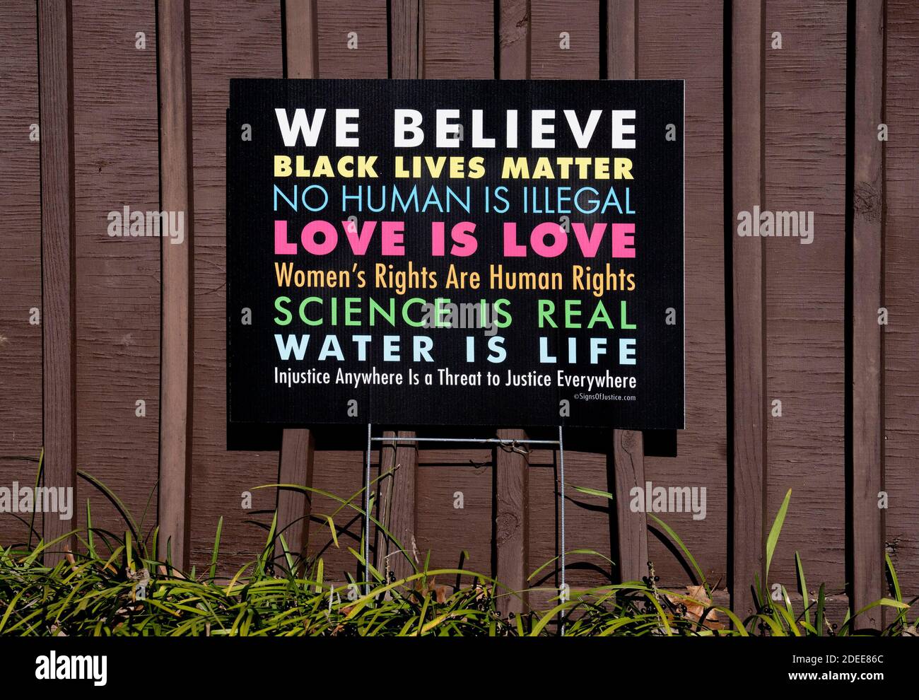 Social Justice sign in suburban neighborhood Stock Photo - Alamy