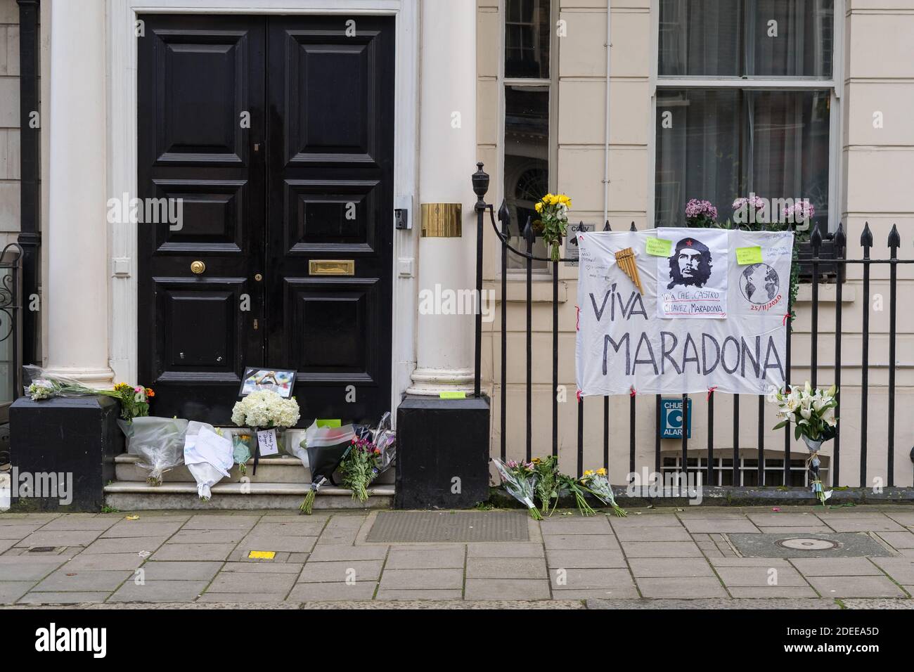 People leave a memorial outside the Argentine Embassy for Diego ...