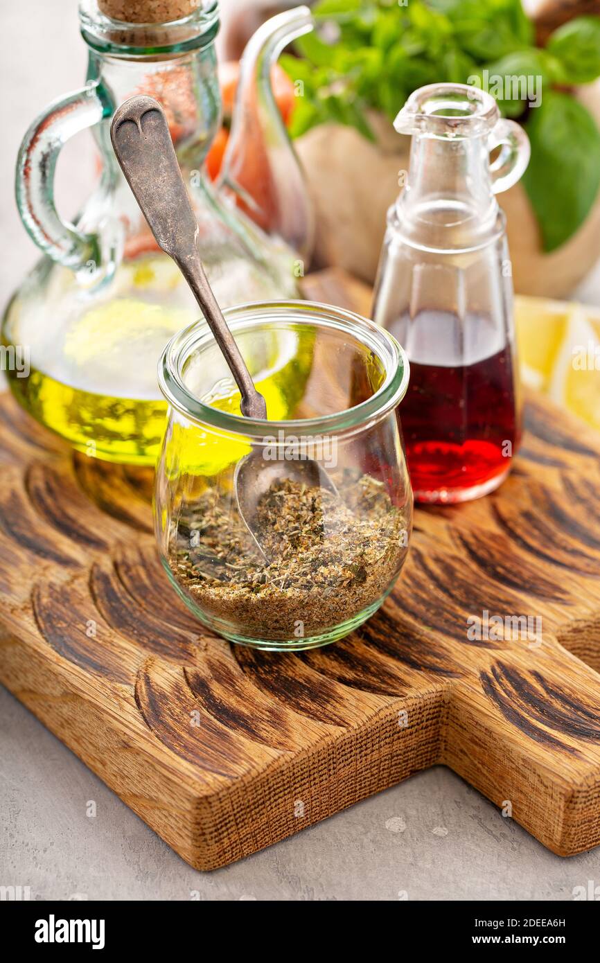 Herbs, spices with oil and vinegar Stock Photo - Alamy