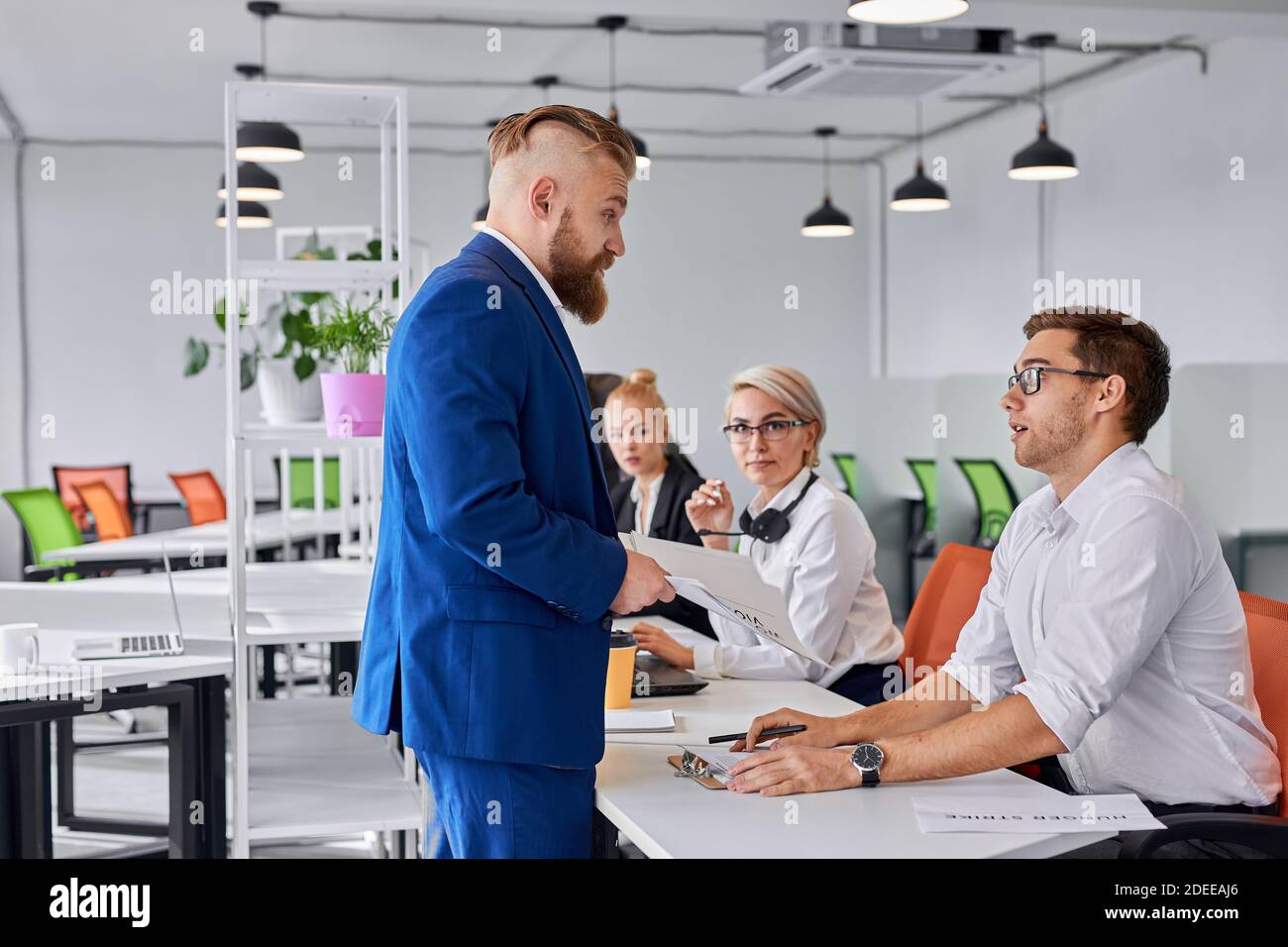 irritated angry director of company scolds man for bad work, going to ...