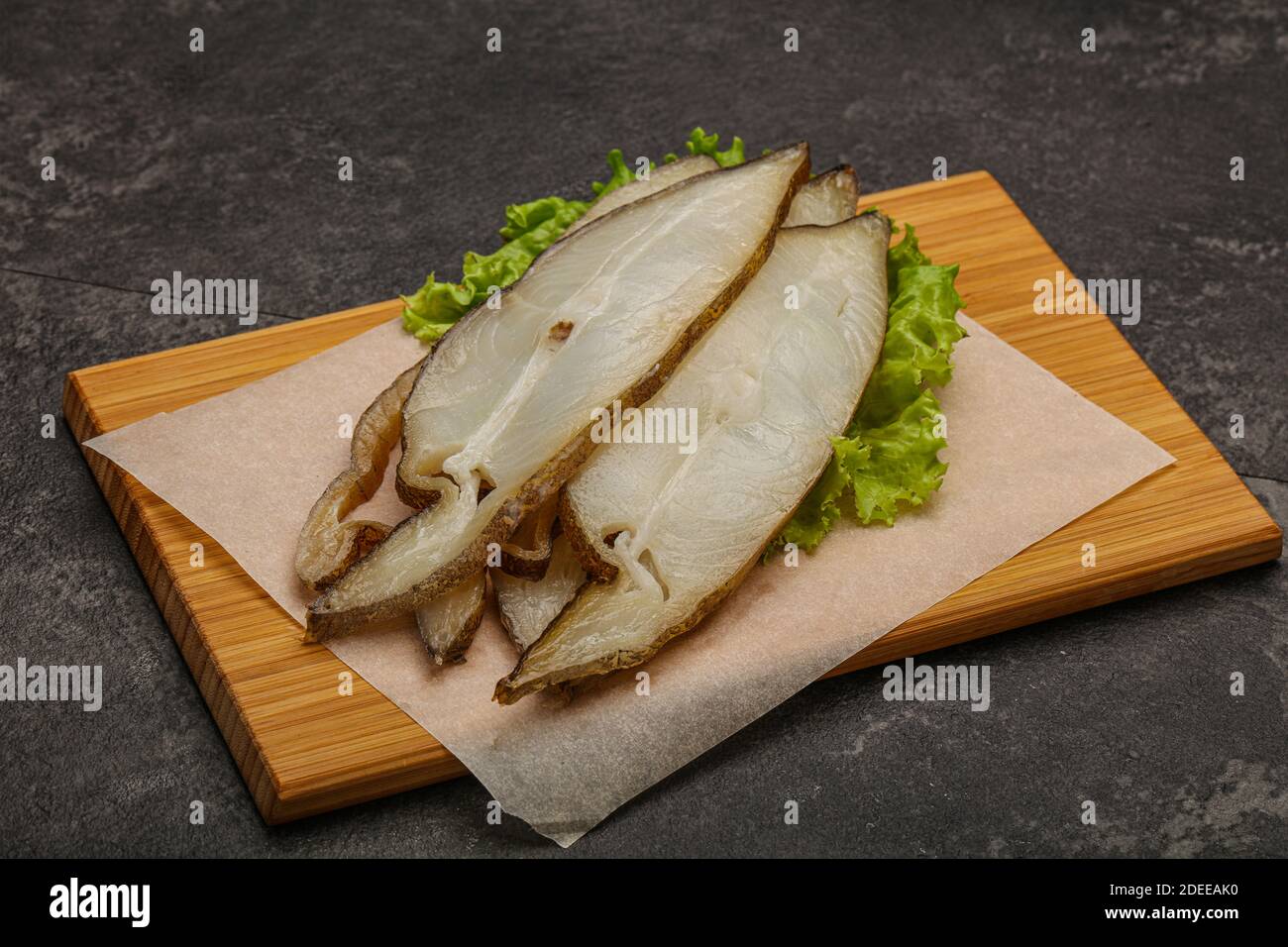 Delicous smoked halibut fish slices snack Stock Photo - Alamy