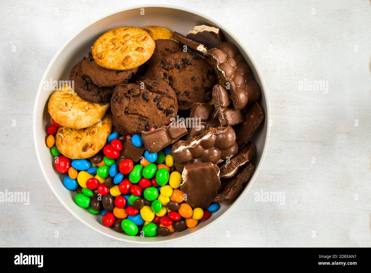 Chocolate candy on the white background, colorful candy texture, close ...