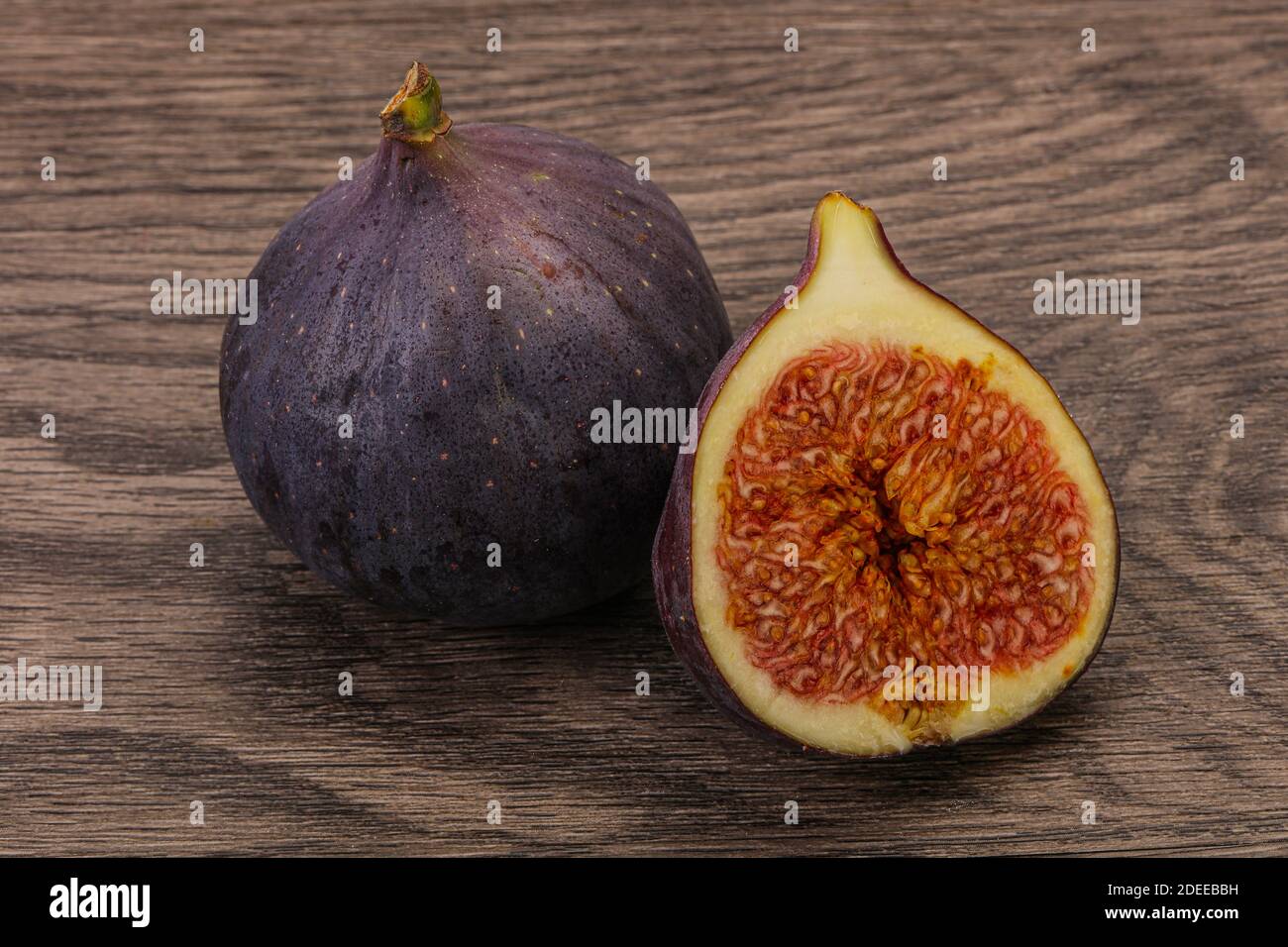 Sweet purple slice of fig fruit Stock Photo - Alamy
