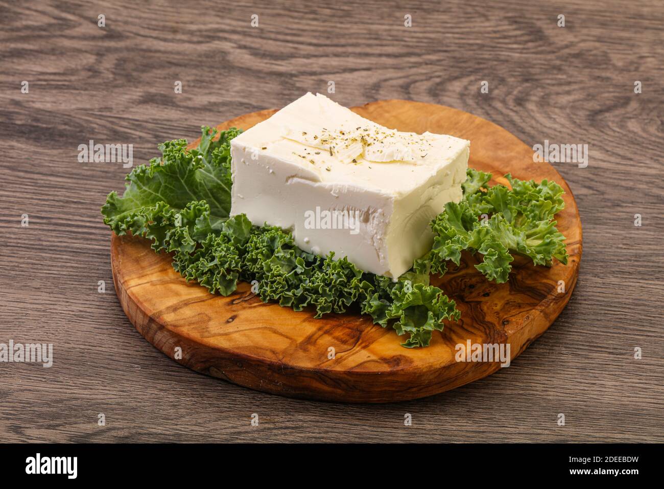 Traditional tasty Greek Feta soft cheese brick Stock Photo - Alamy