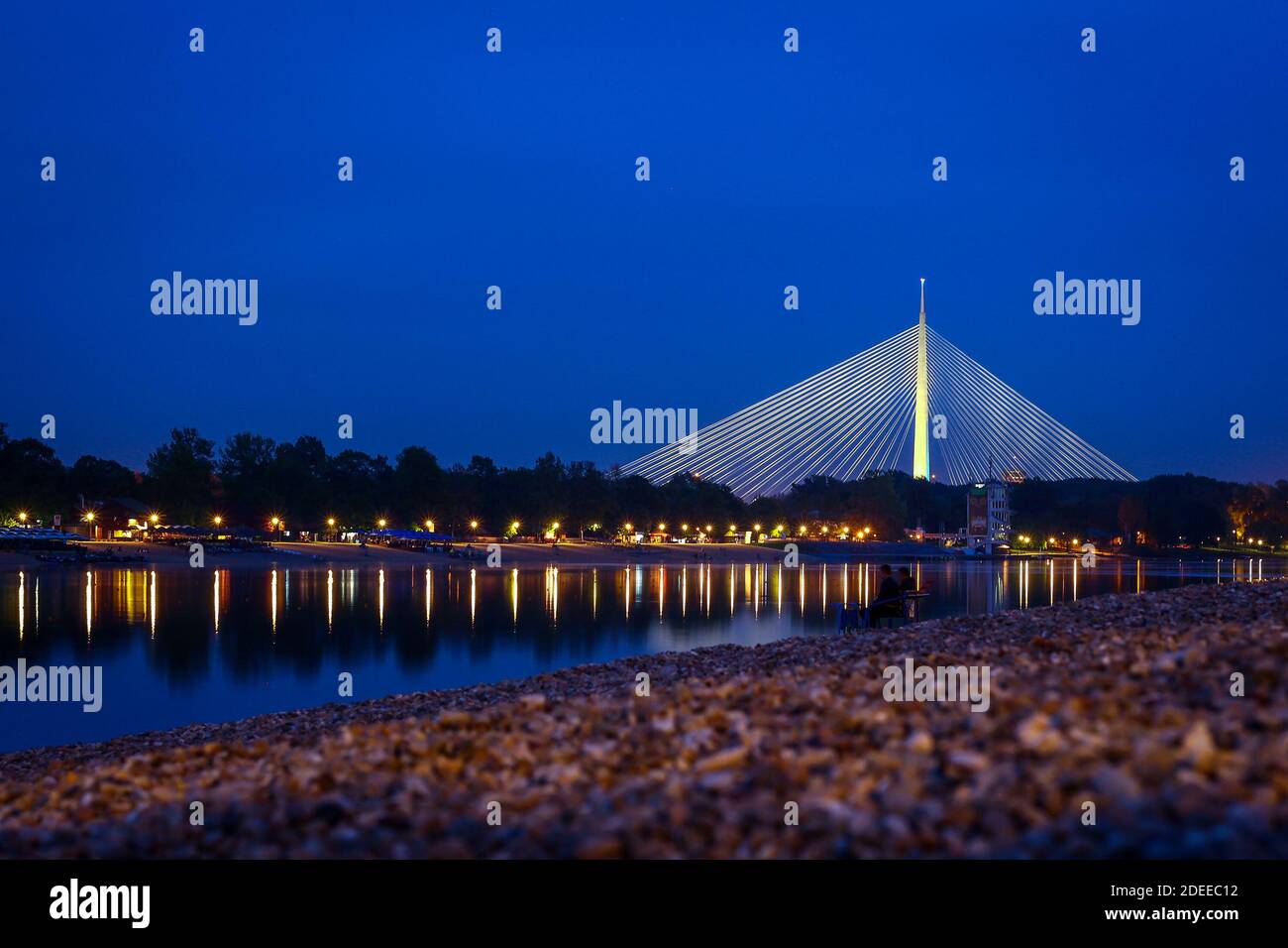 A beautiful shot from the beach to the Cable-stayed bridge at night ...