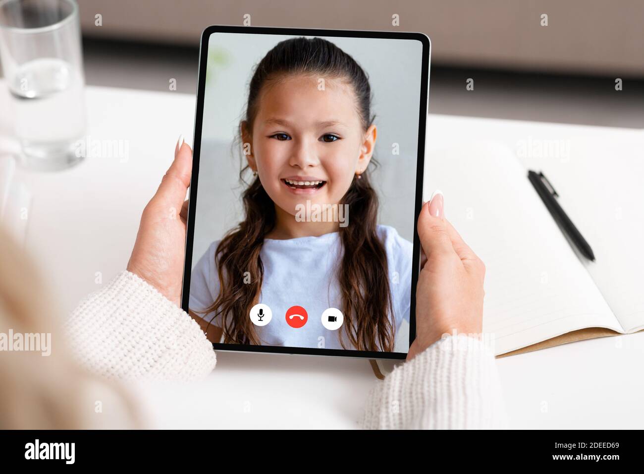 Woman Making Video Call Talking With Child Online At Workplace Stock ...
