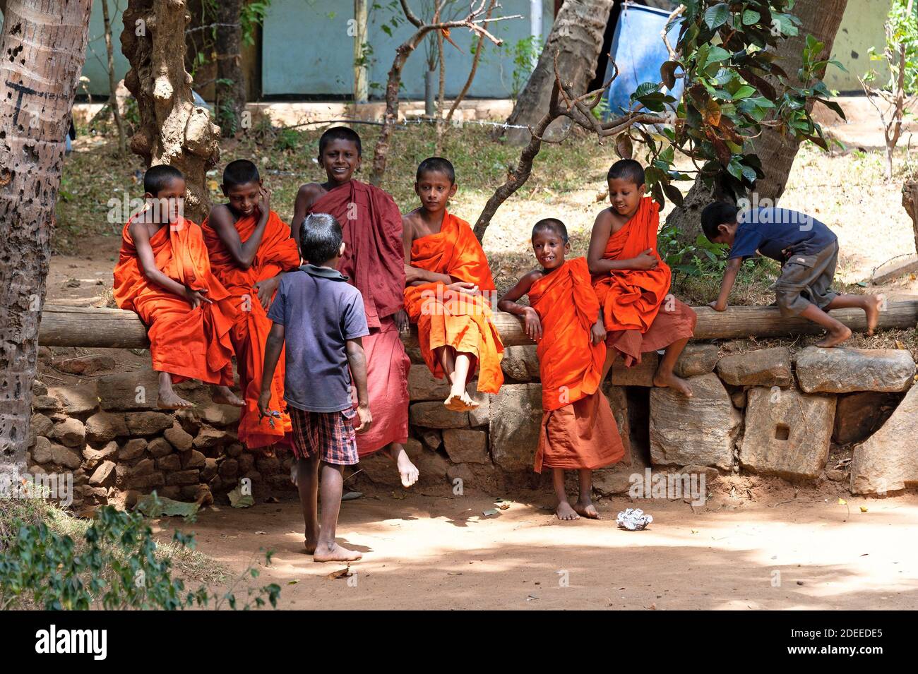 Dambulla, Sri Lanka - July 2011: children with Buddhist monk clothes ...