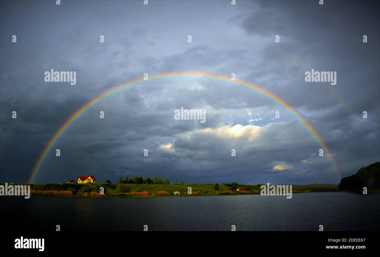 Shot rainbow rain sun hi-res stock photography and images - Alamy
